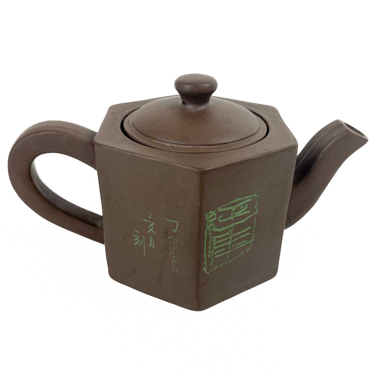 Lot 367 - A Chinese hexagonal Yixing teapot, with
