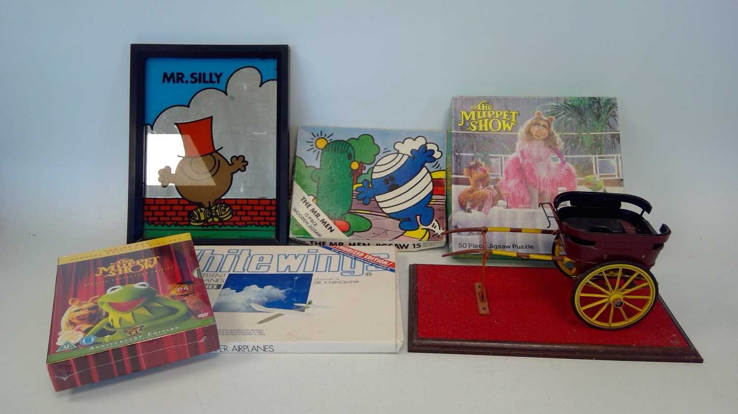 Lot 101 - A Mr Silly mirror with a selection of toys,