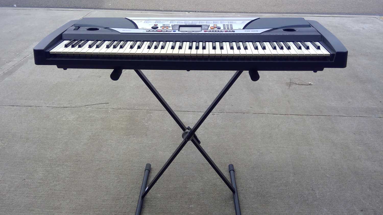 Lot 13 - A Yamaha, PSR-GX76 Keyboard and Stand. The