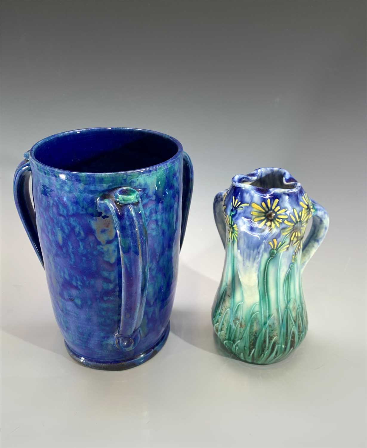 Lot 976 - An Austrian pottery three handled vase