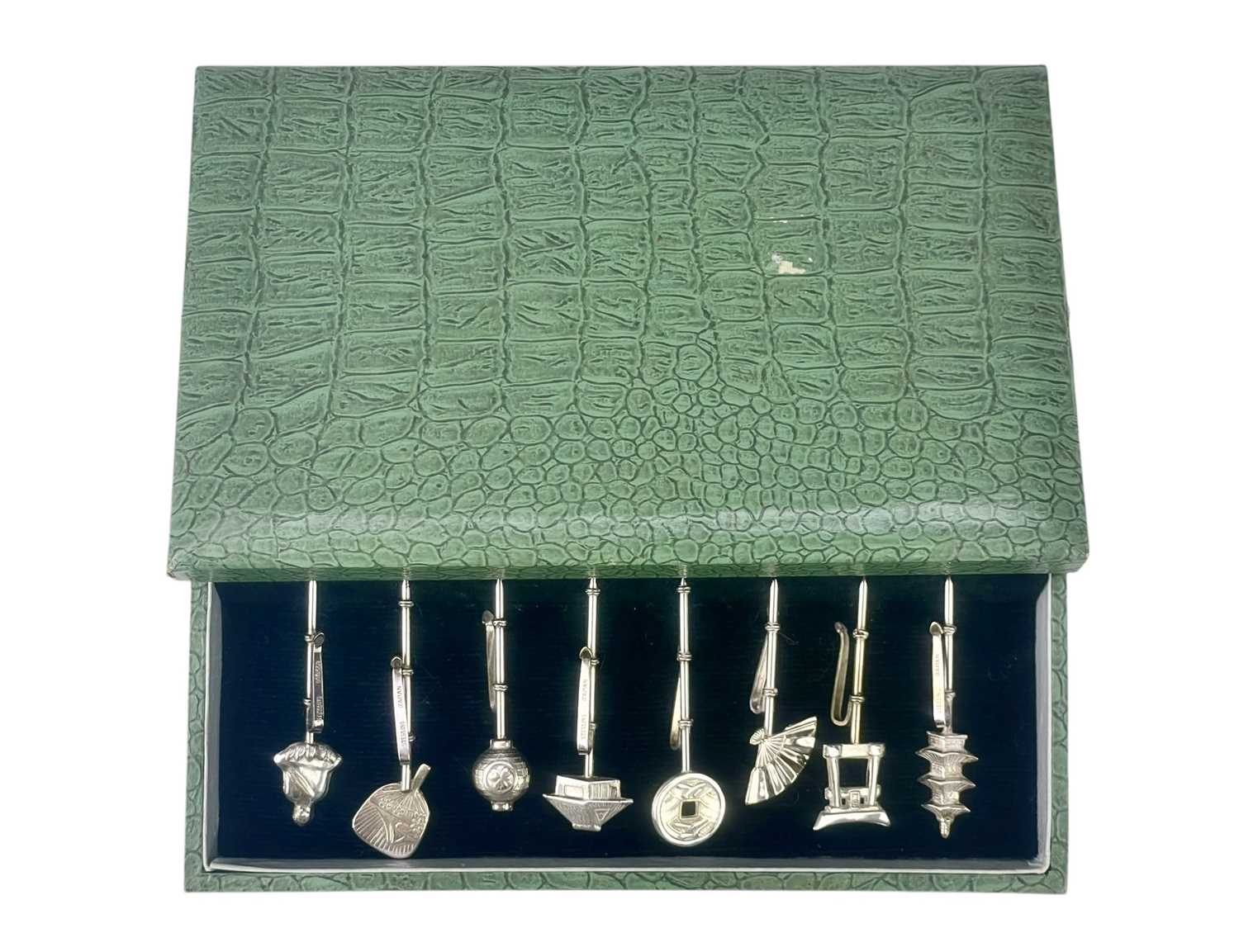 Lot 658 - A set of eight Japanese Sterling silver