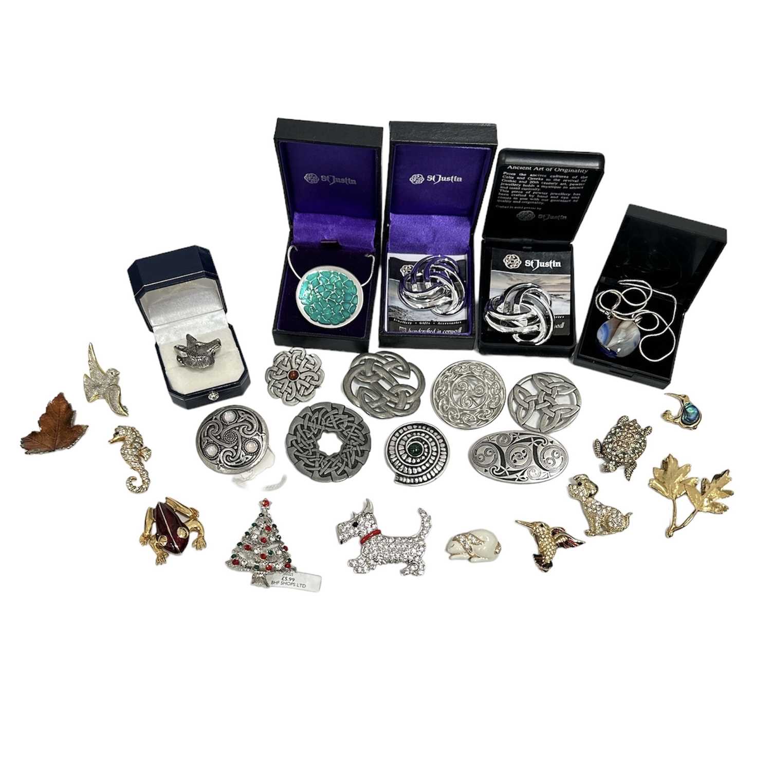 Lot 127 - A collection of St Justin pewter broaches