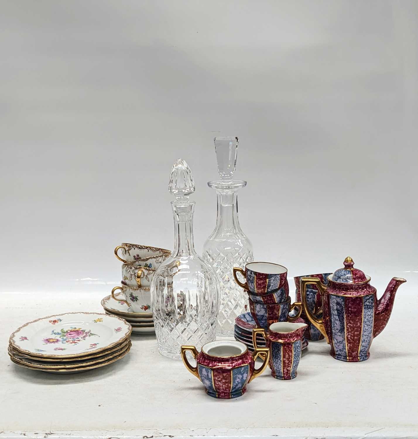 Lot 52 - Two glass decanters, a Dresden tea set and a
