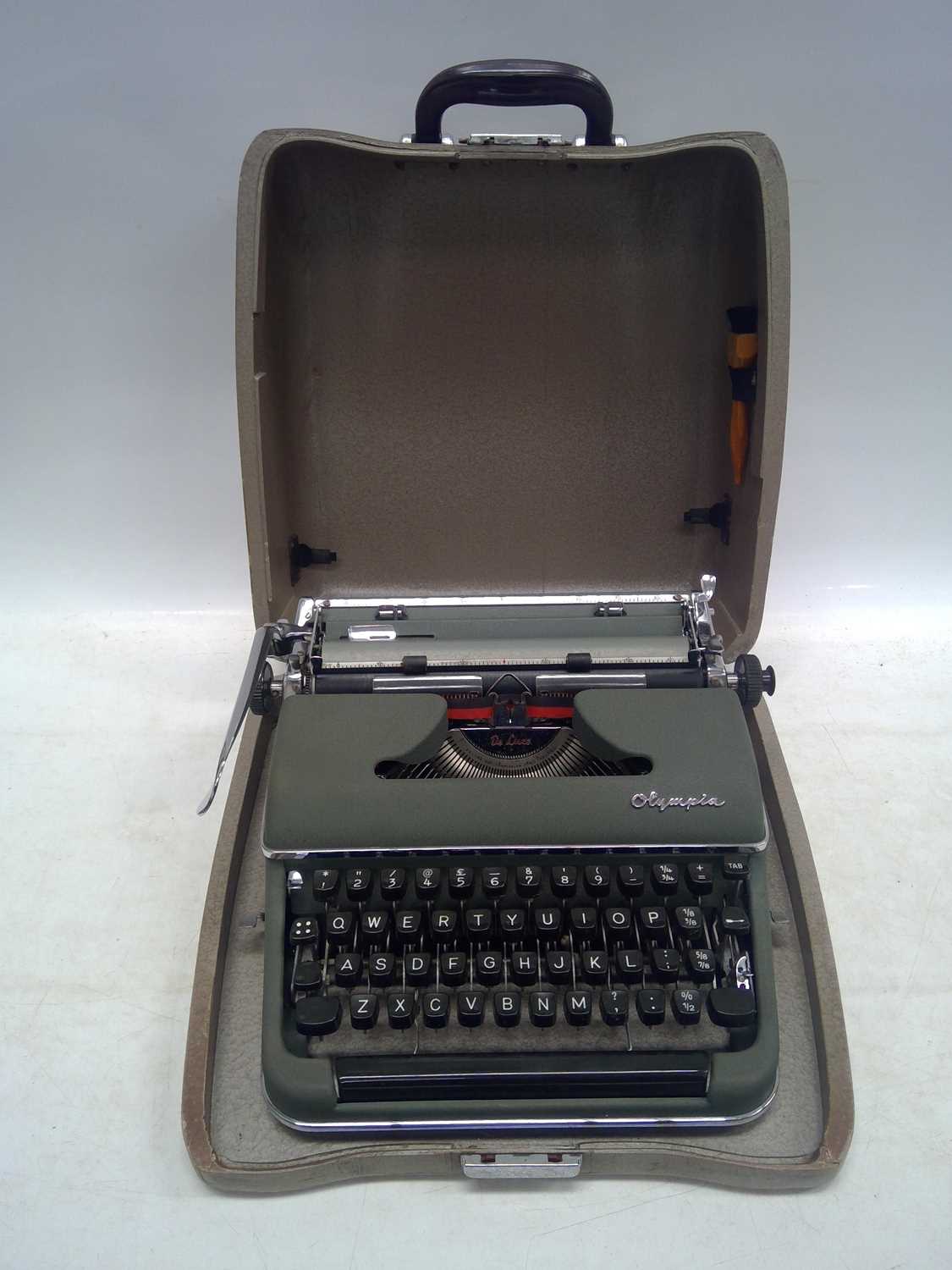 Lot 92 - An Olympia De Luxe Typewriter with a carry