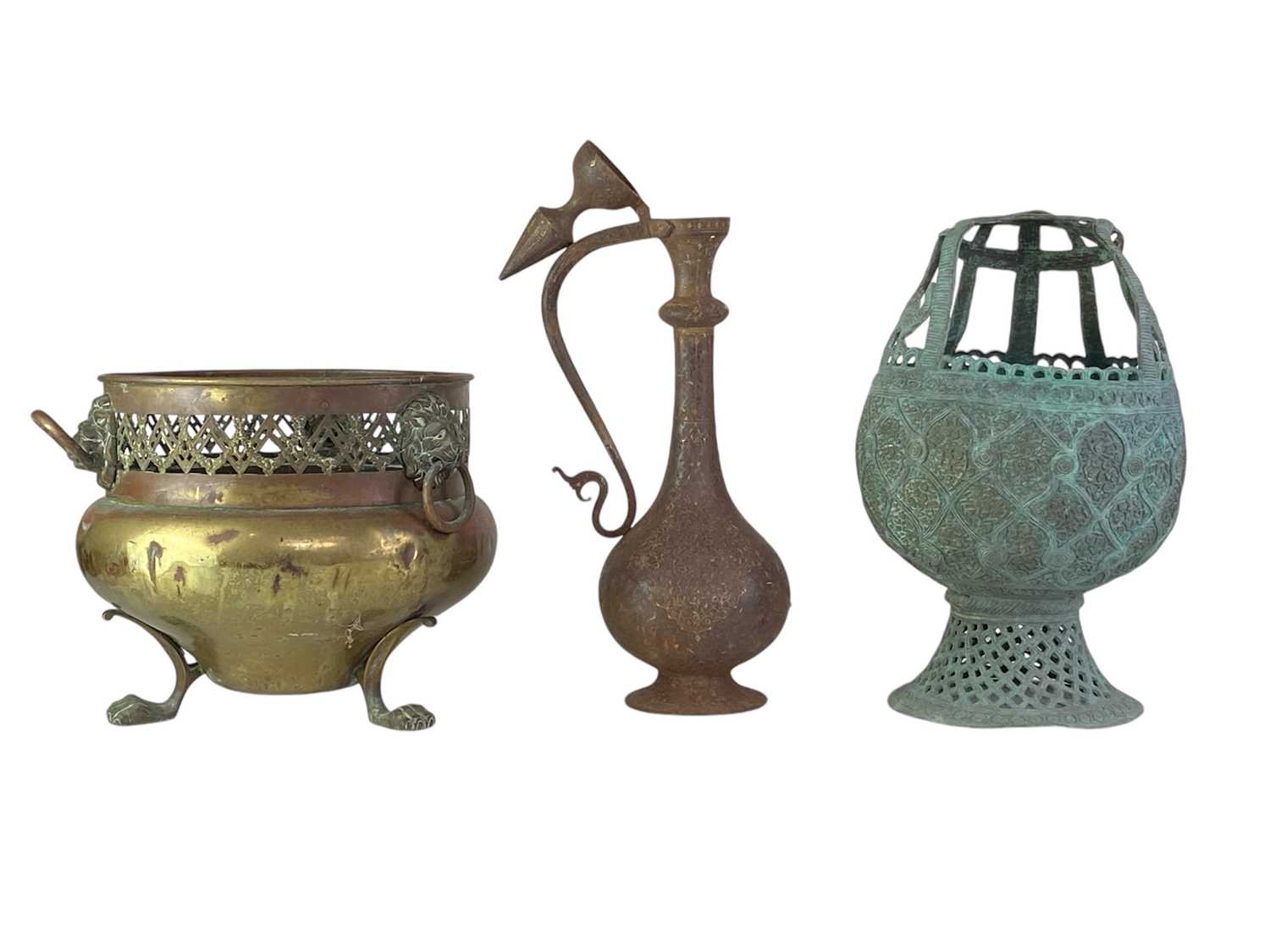 Lot 5 - A Persian damascened iron ewer.