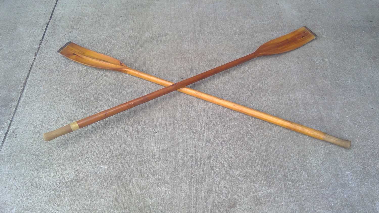 Lot 247 - A pair of wooden oars. The Oars are 200cm