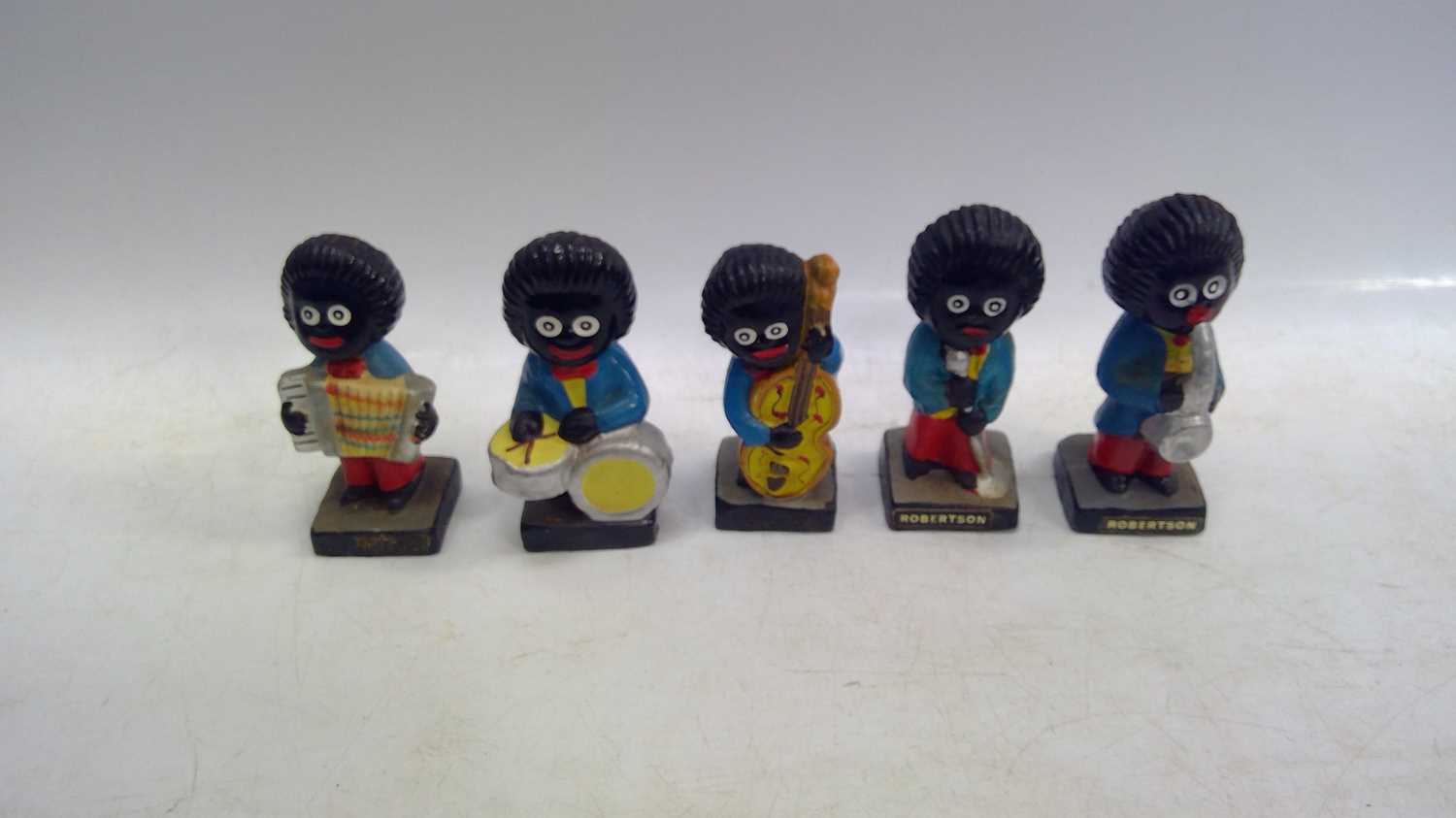 Lot 19 - A Robinsons Jam Golly Band. The Figures are