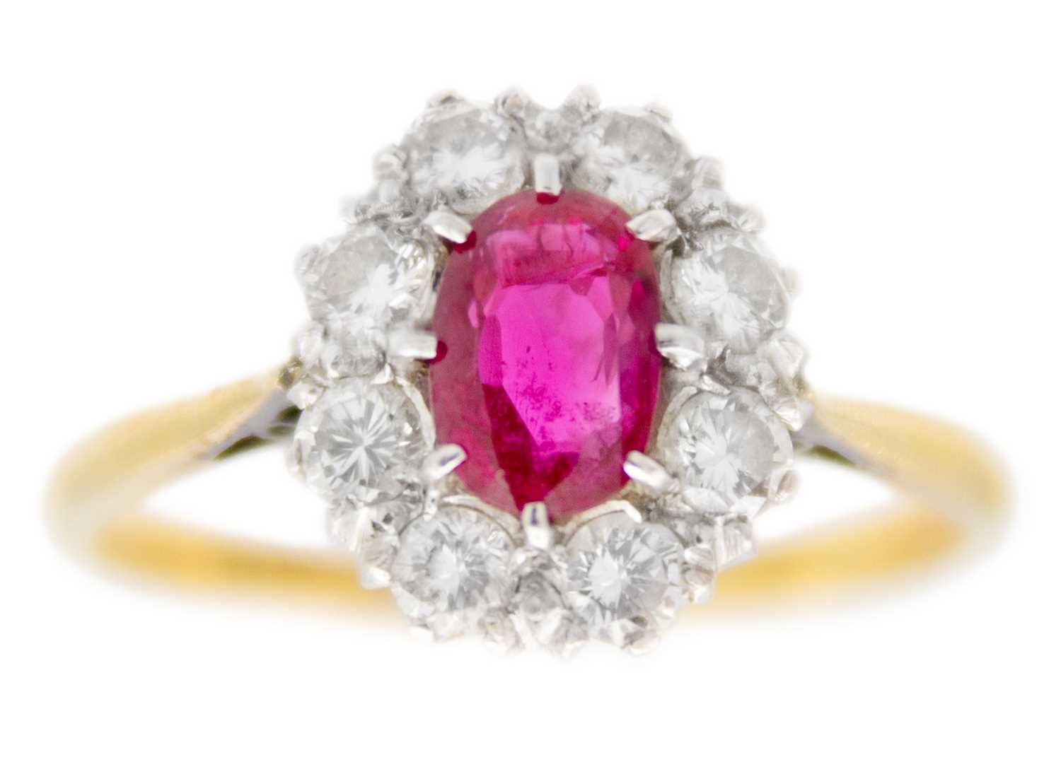 Lot 168 - An 18ct and platinum ruby and diamond set