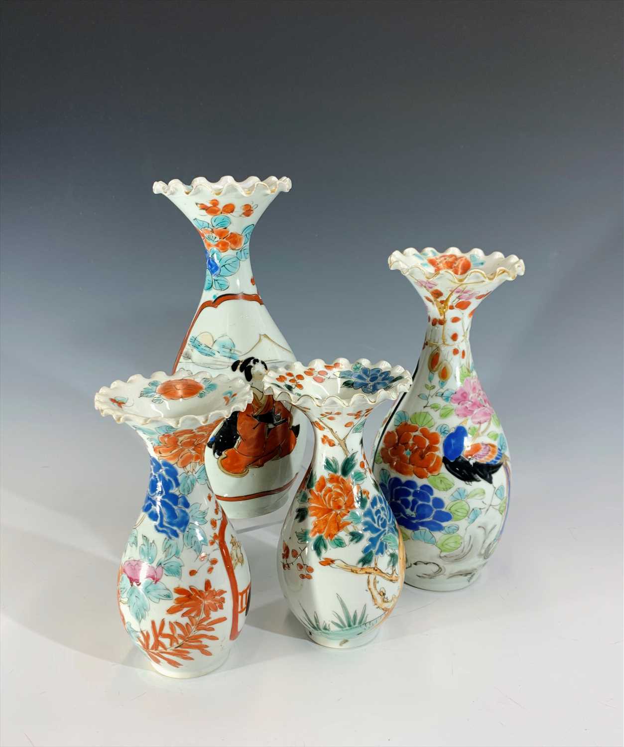 Lot 742 - Two pairs of Japanese porcelain vases, red