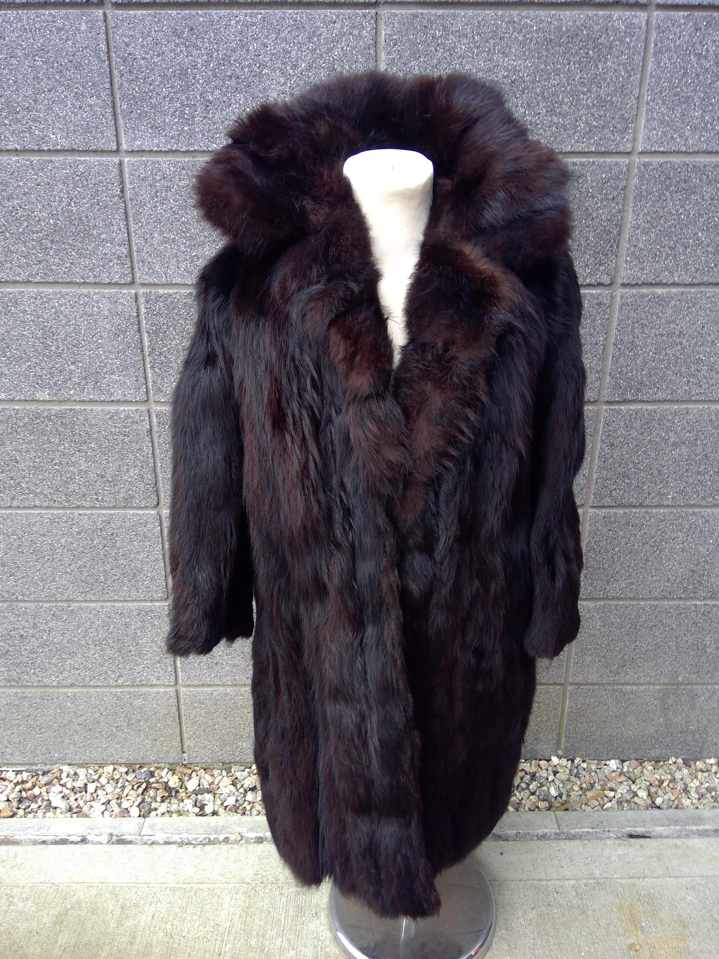 Lot 87 - A Simpsons Fur Coat. Size and type unknown.