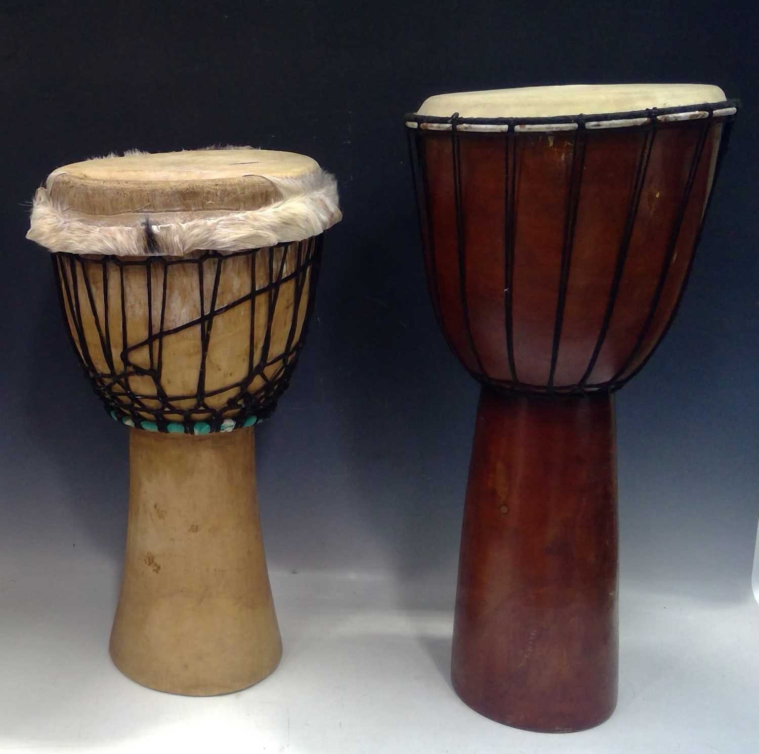 Lot 200 - Two Djembe Drums. The Taller Drum measures