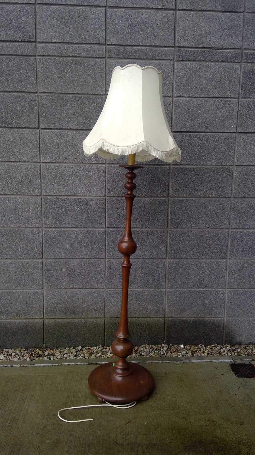 Lot 47 - A Turned Mahogany Lamp Stand. The Stand is