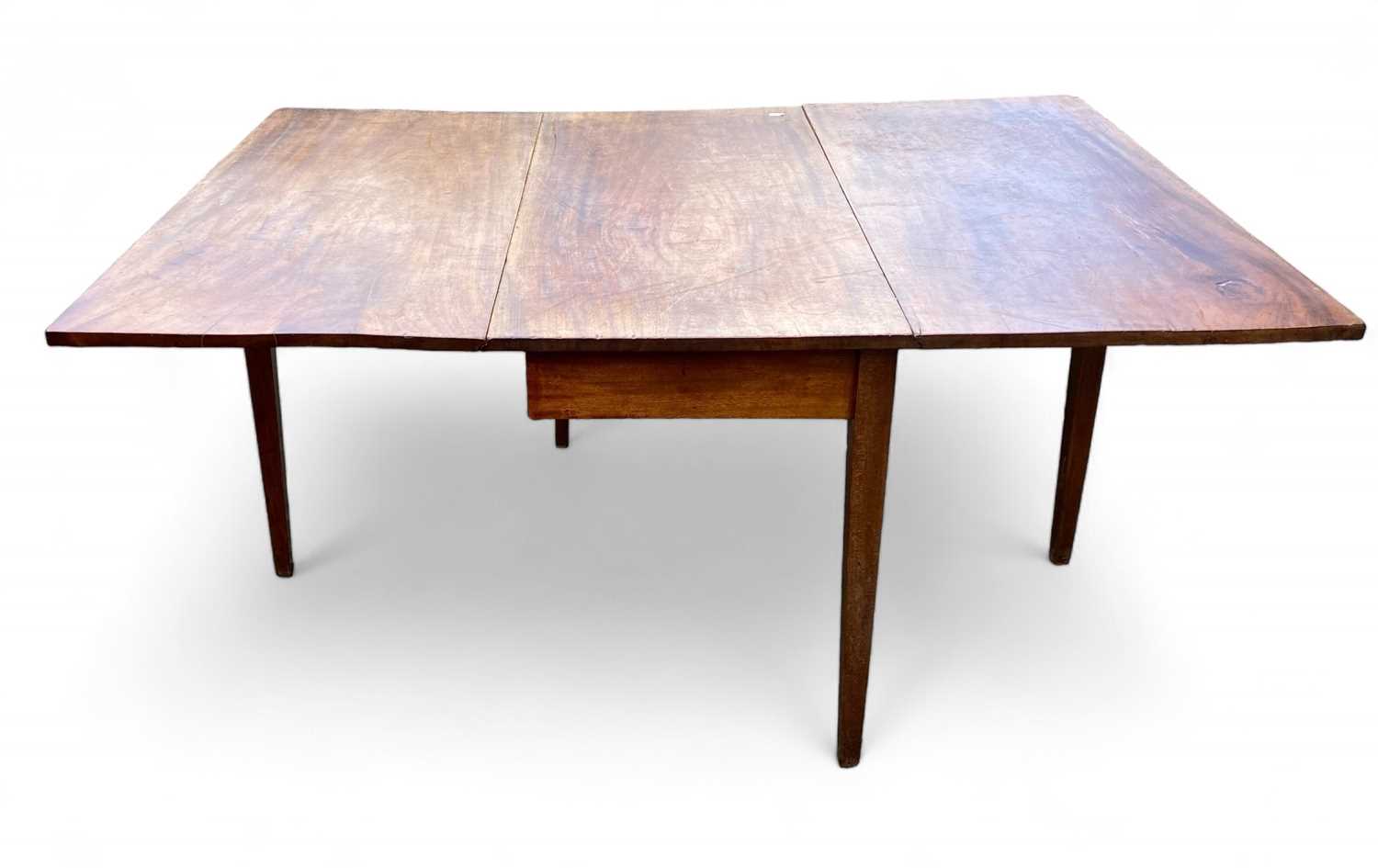 Lot 39 - A George III mahogany twin flap table