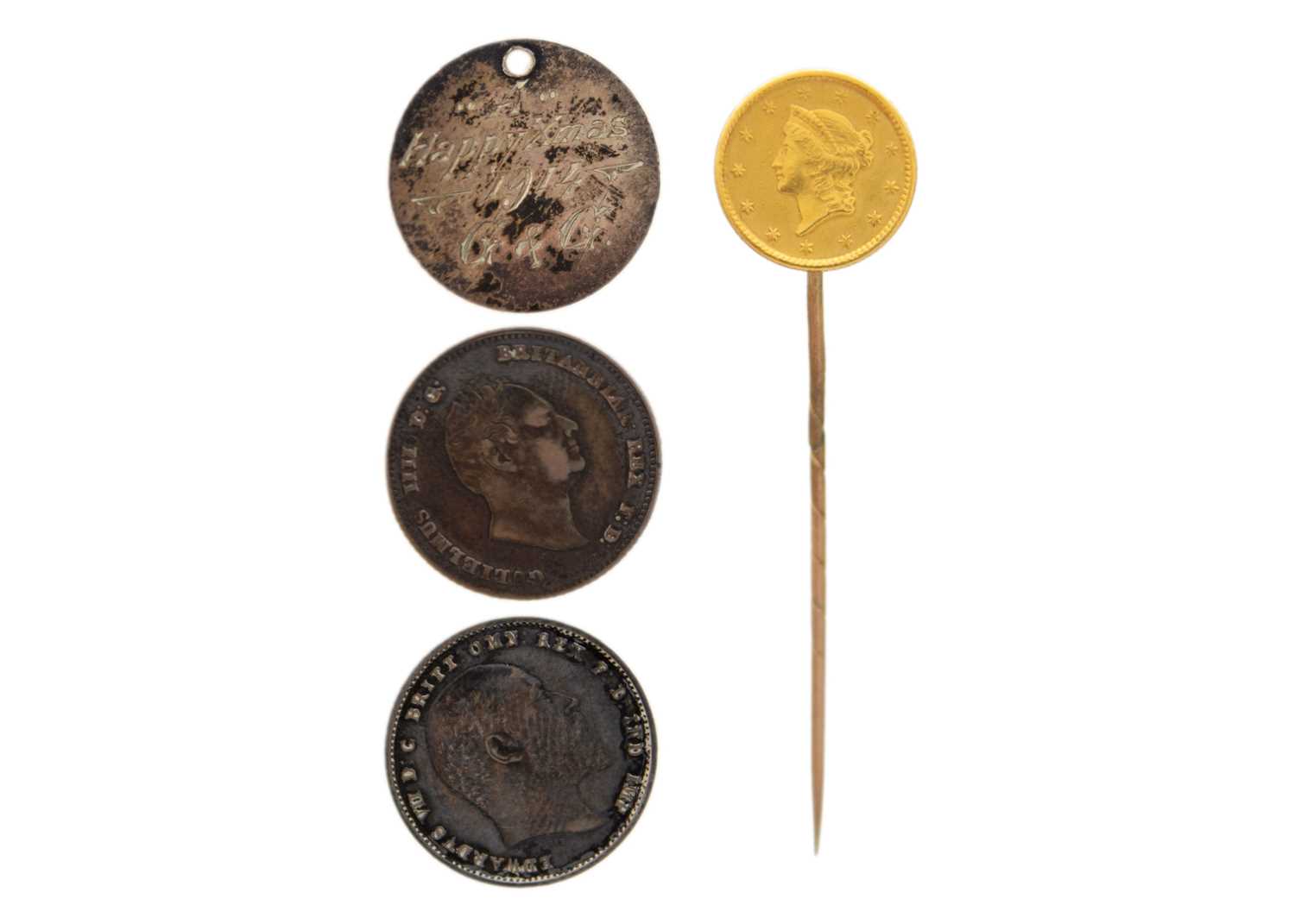 Lot 67 - An American 1 dollar gold coin tie pin and a