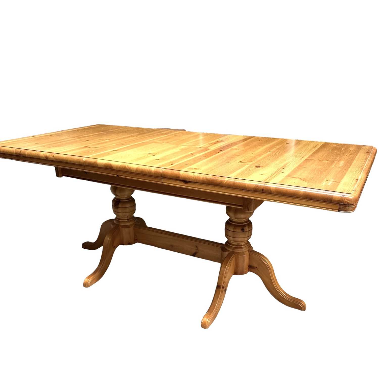 Lot 22 - A Twin Pedestal, Pine Extending Dining Table.