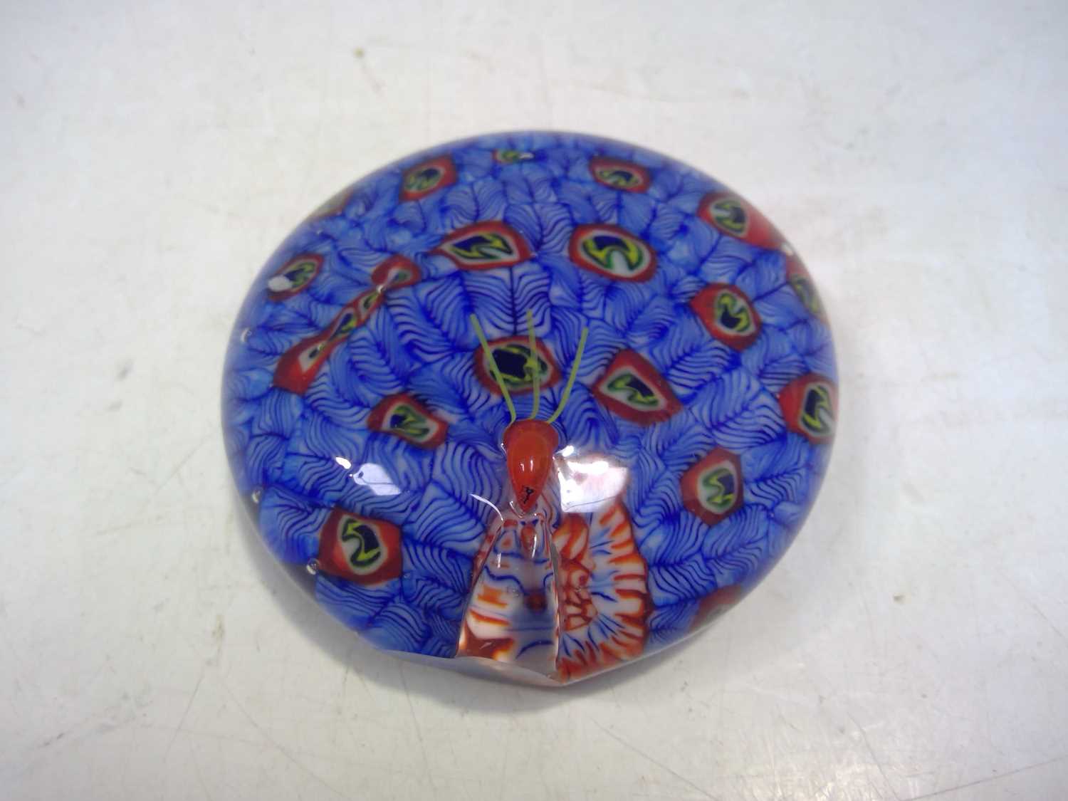 Lot 107 - A Peacock Paperweight. The Paperweight is