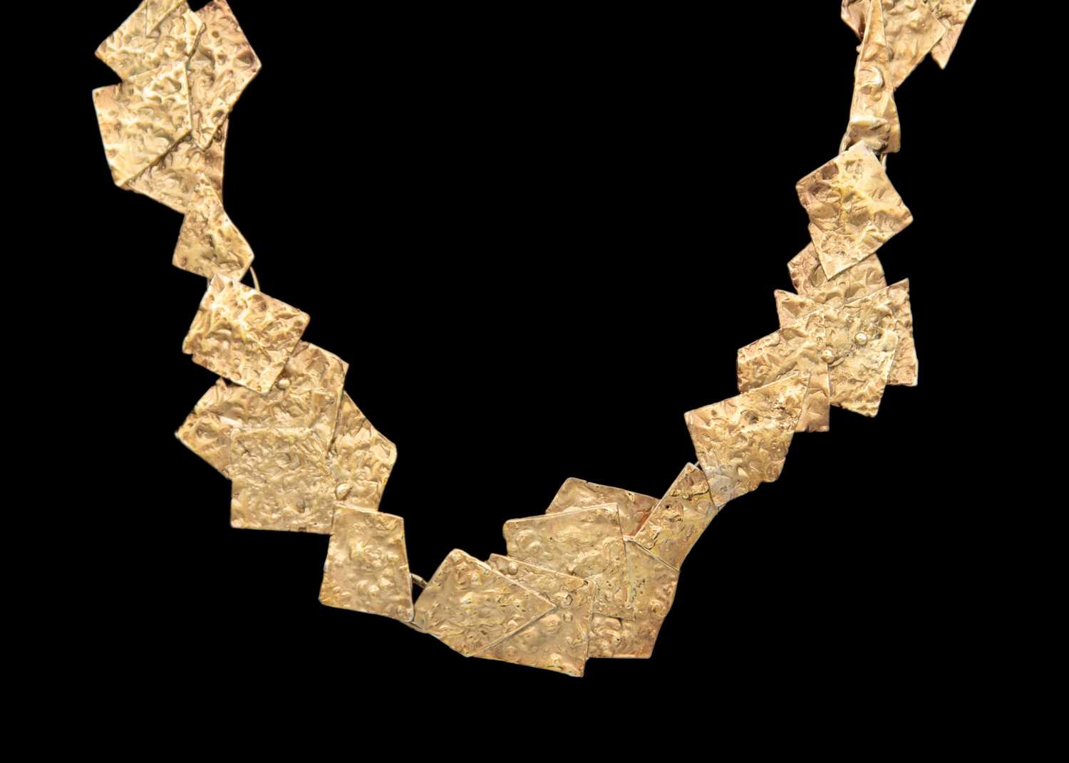 Lot 98 - HELEN FEILER - A gilt metal abstract design