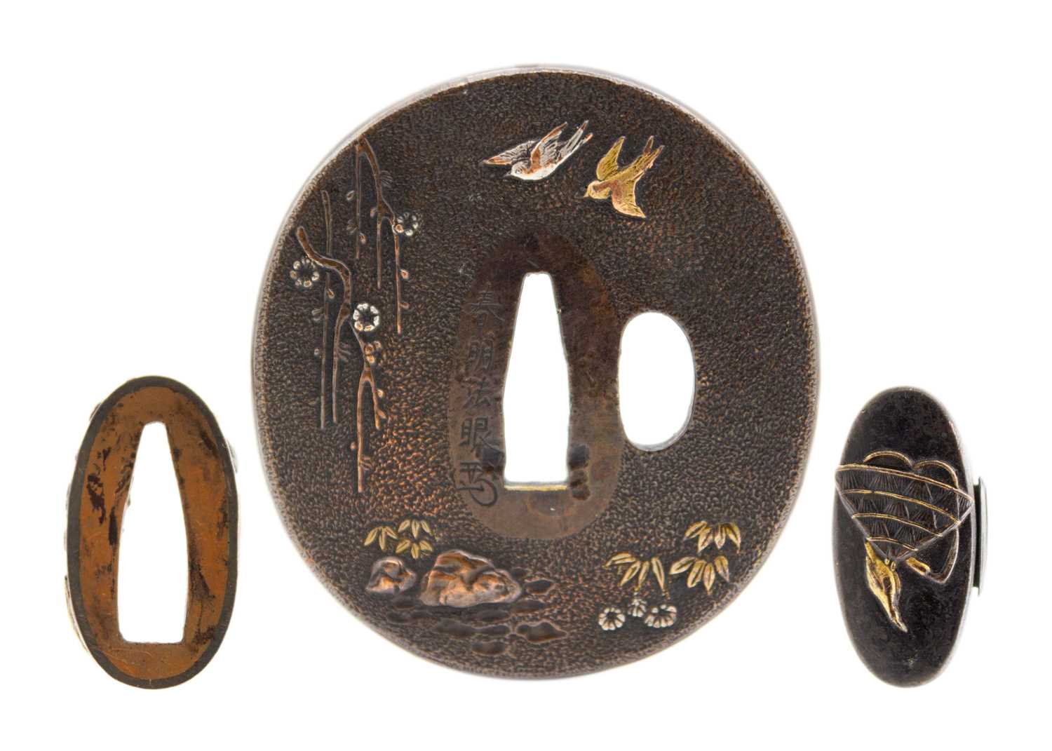 Lot 262 - A Japanese inlaid fuichi and kashira, Edo