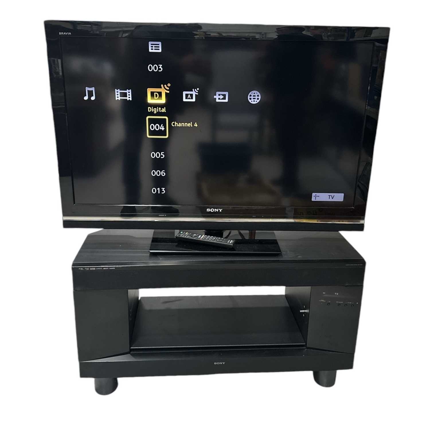 Lot 6 - Sony Bravia KDL-46W5500 is on a theatre stand