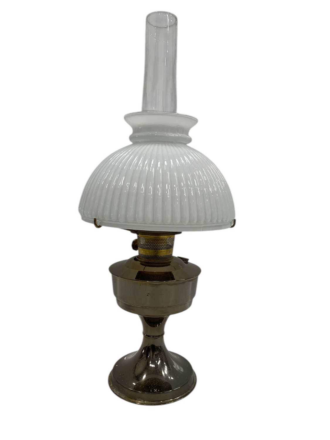 Lot 293 - A paraffin Lamp with a milk glass shade.