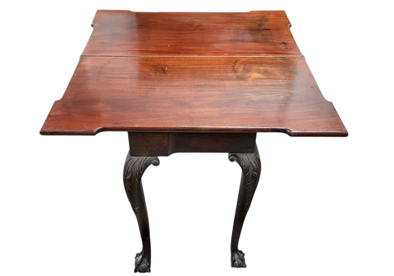 Lot 500 - A George III mahogany fold-top tea table.