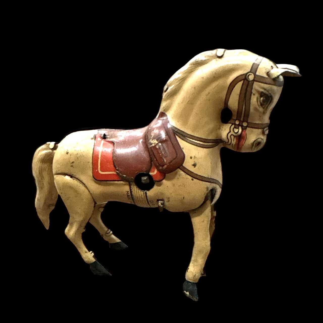 Lot 280 - A vintage tinplate clockwork horse made by D.