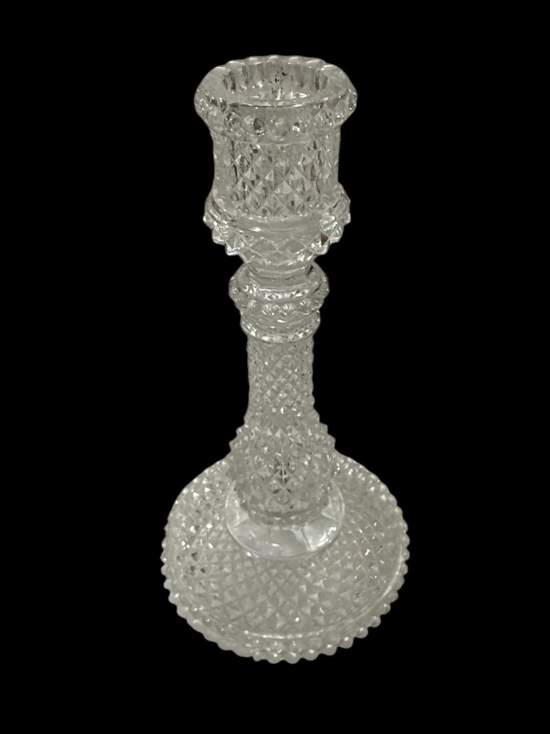 Lot 176 - A Baccarat cut glass candlestick, marked to