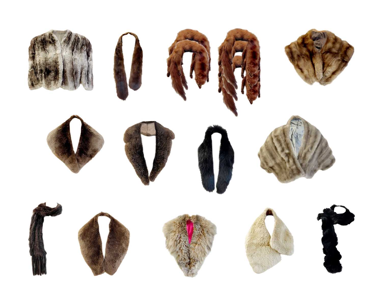 Lot 519 - A good selection of fur shrugs and stoles.