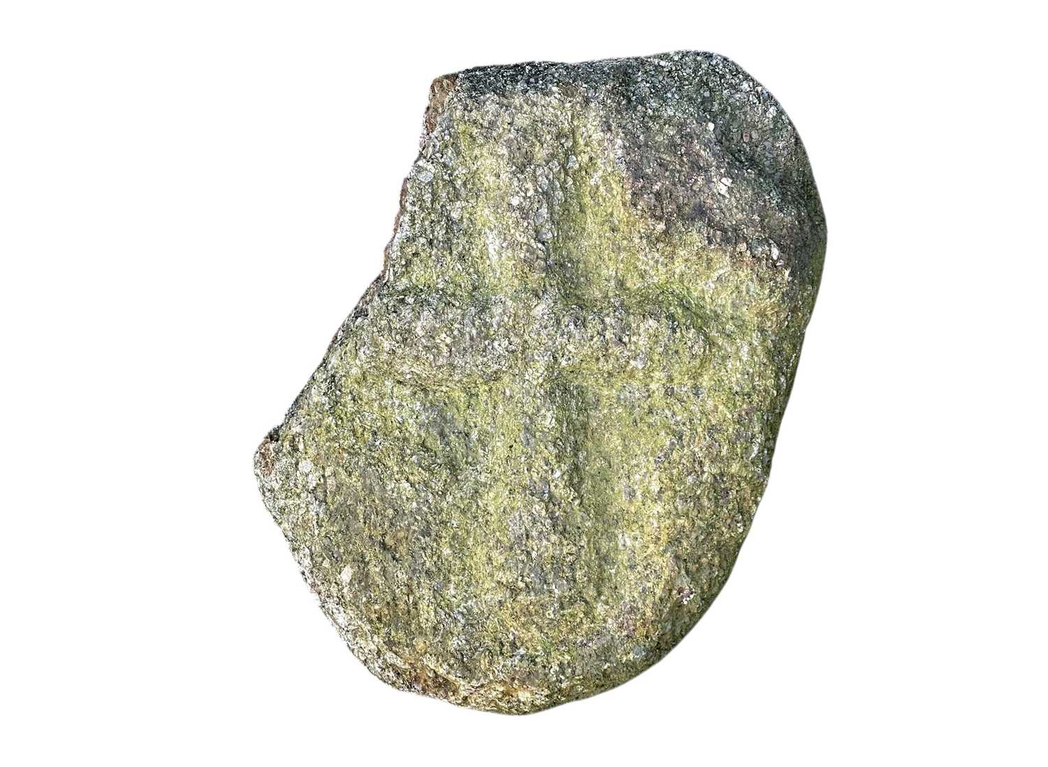 Lot 386 - A small piece of granite, carved with a