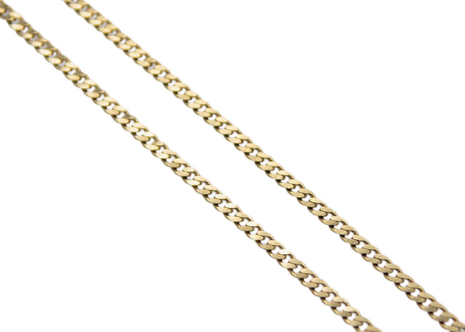 Lot 10 - A 9k yellow gold diamond-cut curb chain.