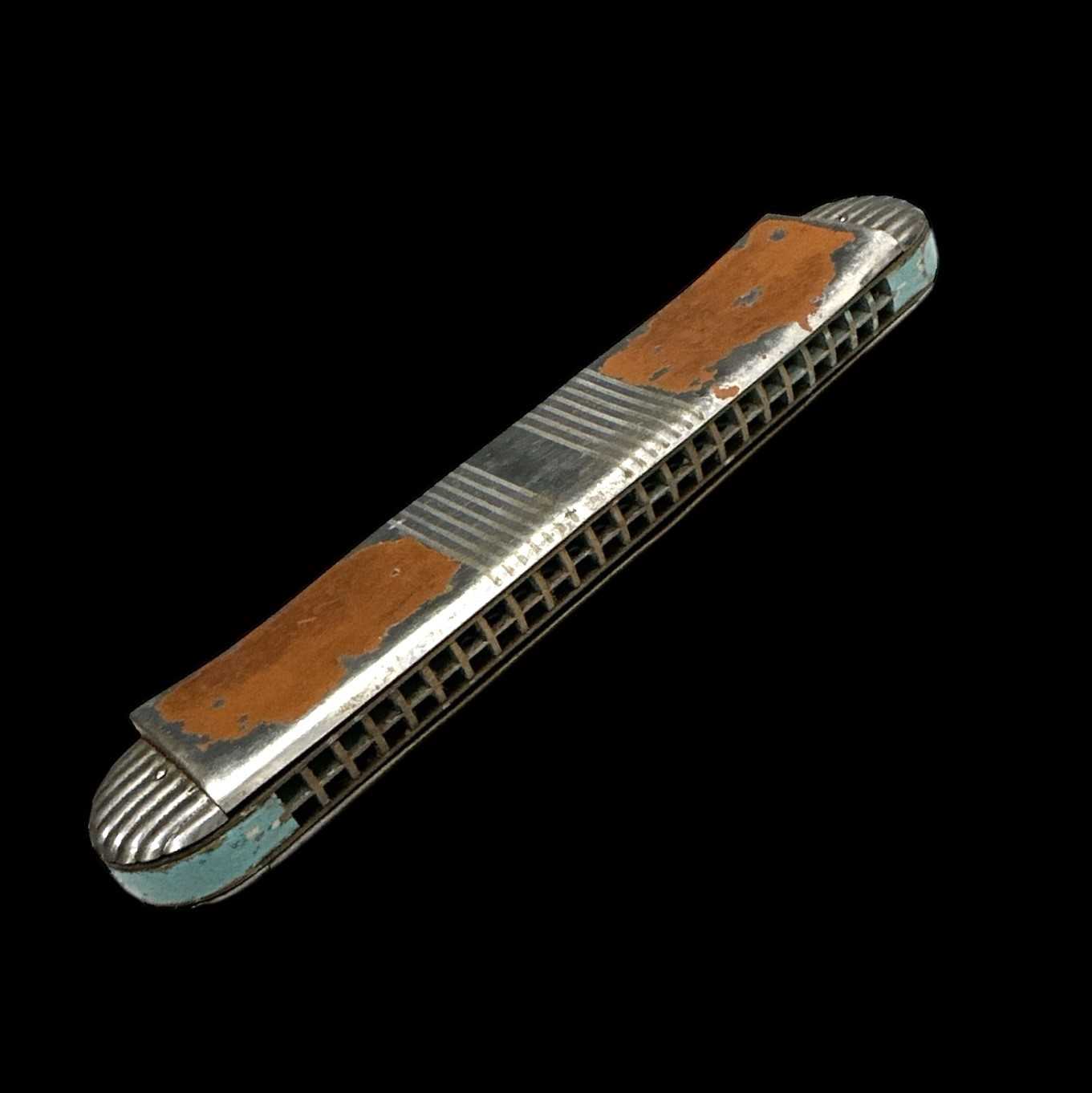 Lot 123 - A 1930s Gamma German harmonica.