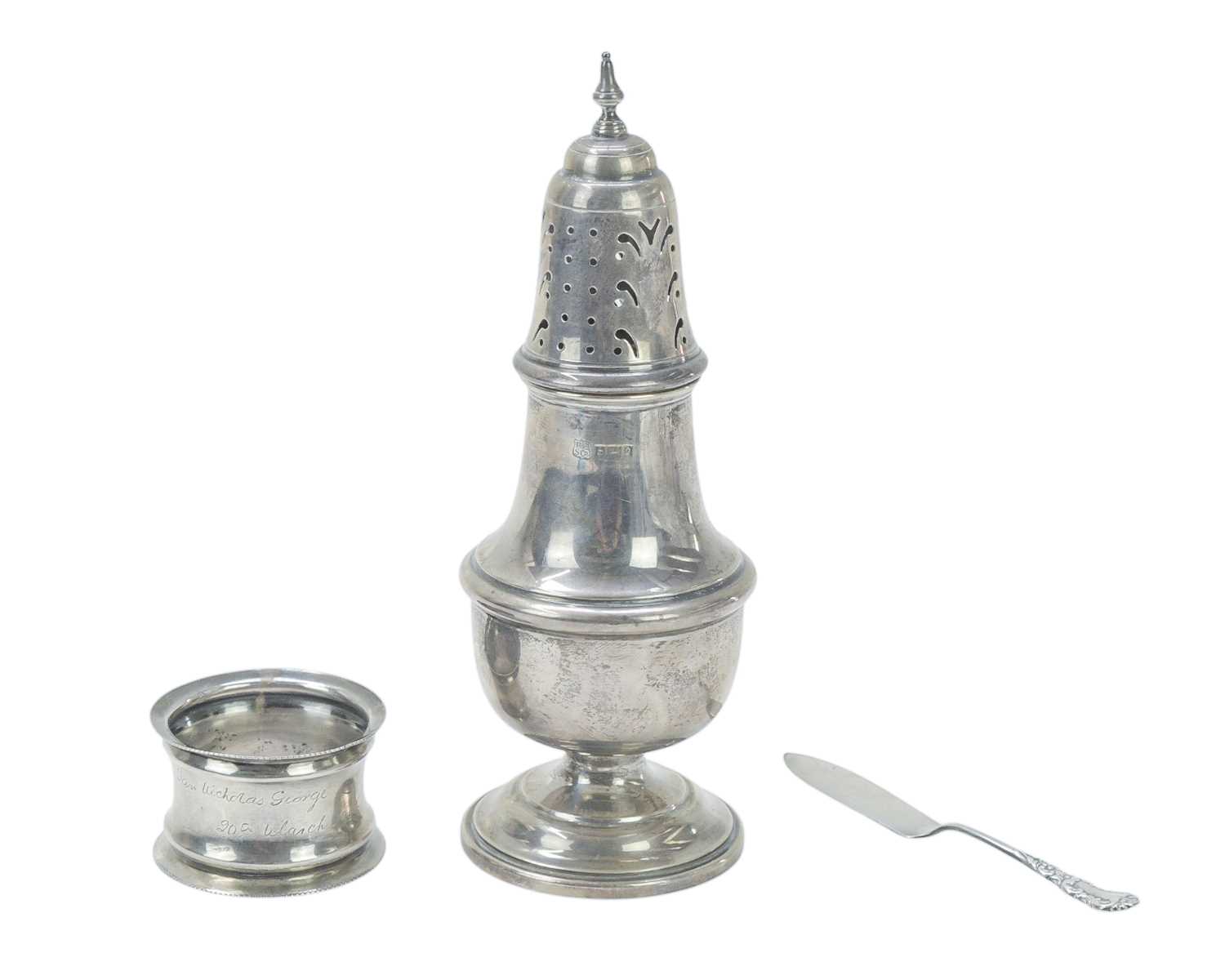 Lot 244 - A silver sugar sifter.