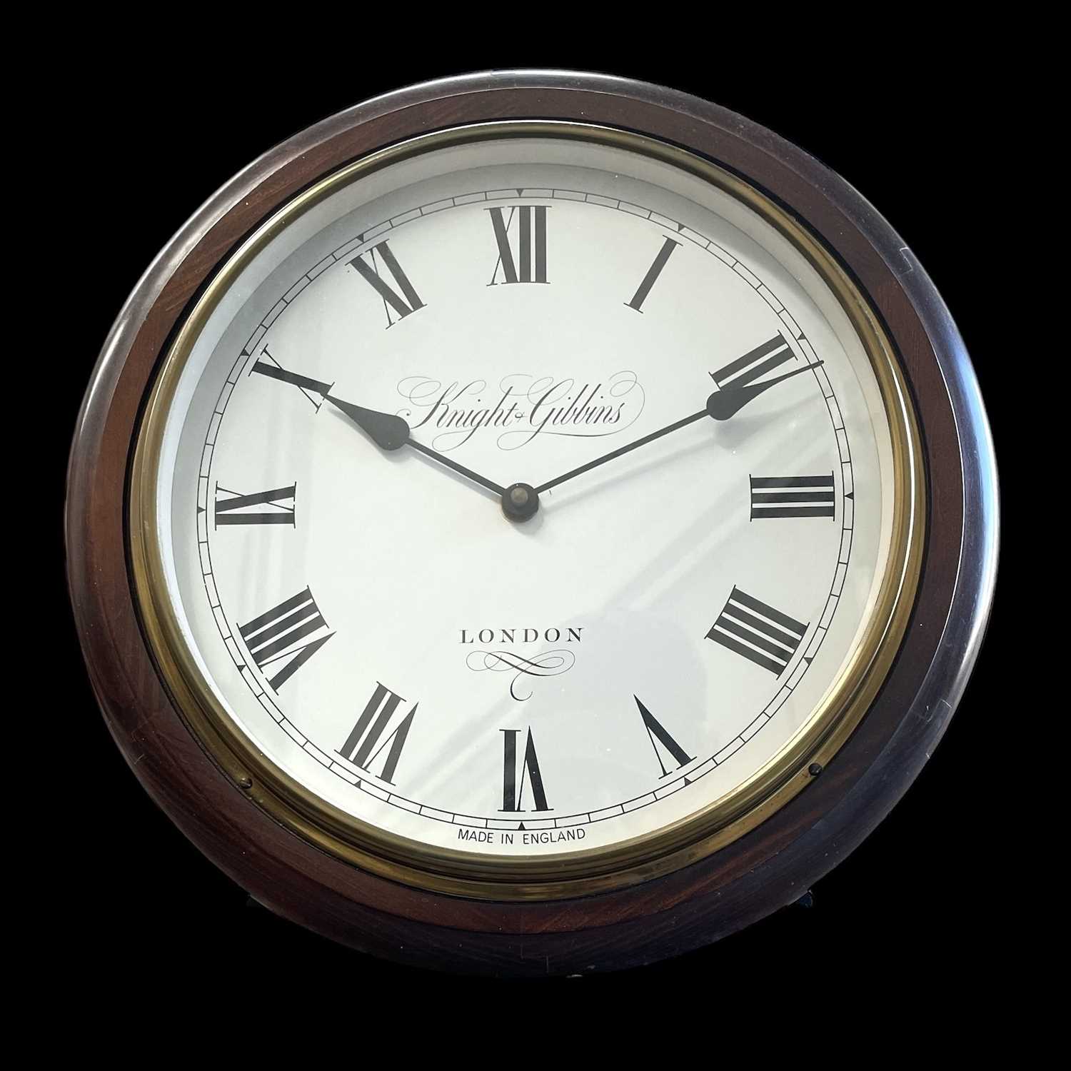 Lot 65 - A Knight Gibbons quartz wall clock 33cdm in