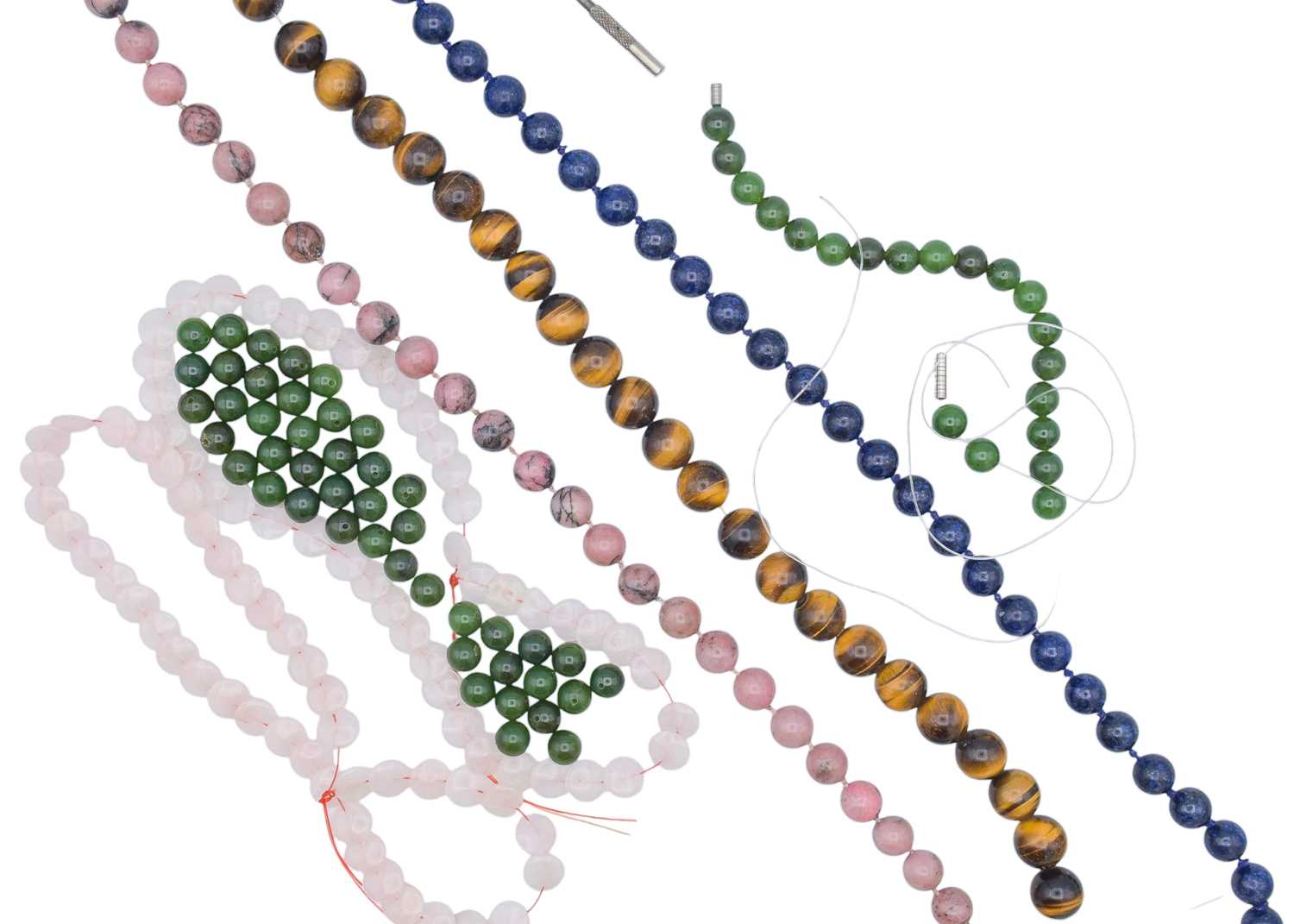 Lot 61 - A selection of gemstone beads.