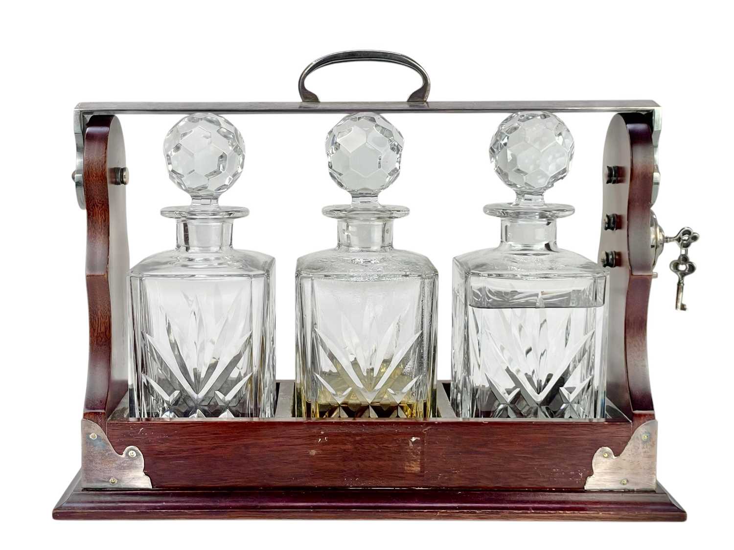 Lot 87 - A modern mahogany and silver plate three