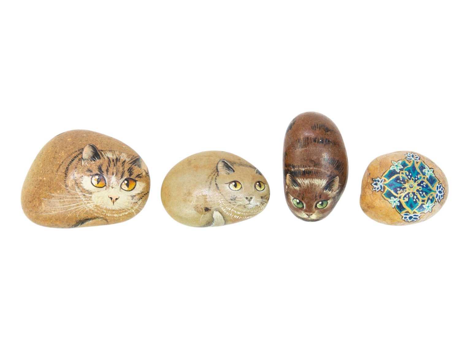 Lot 90 - Mavis White, three painted pebbles, cats.