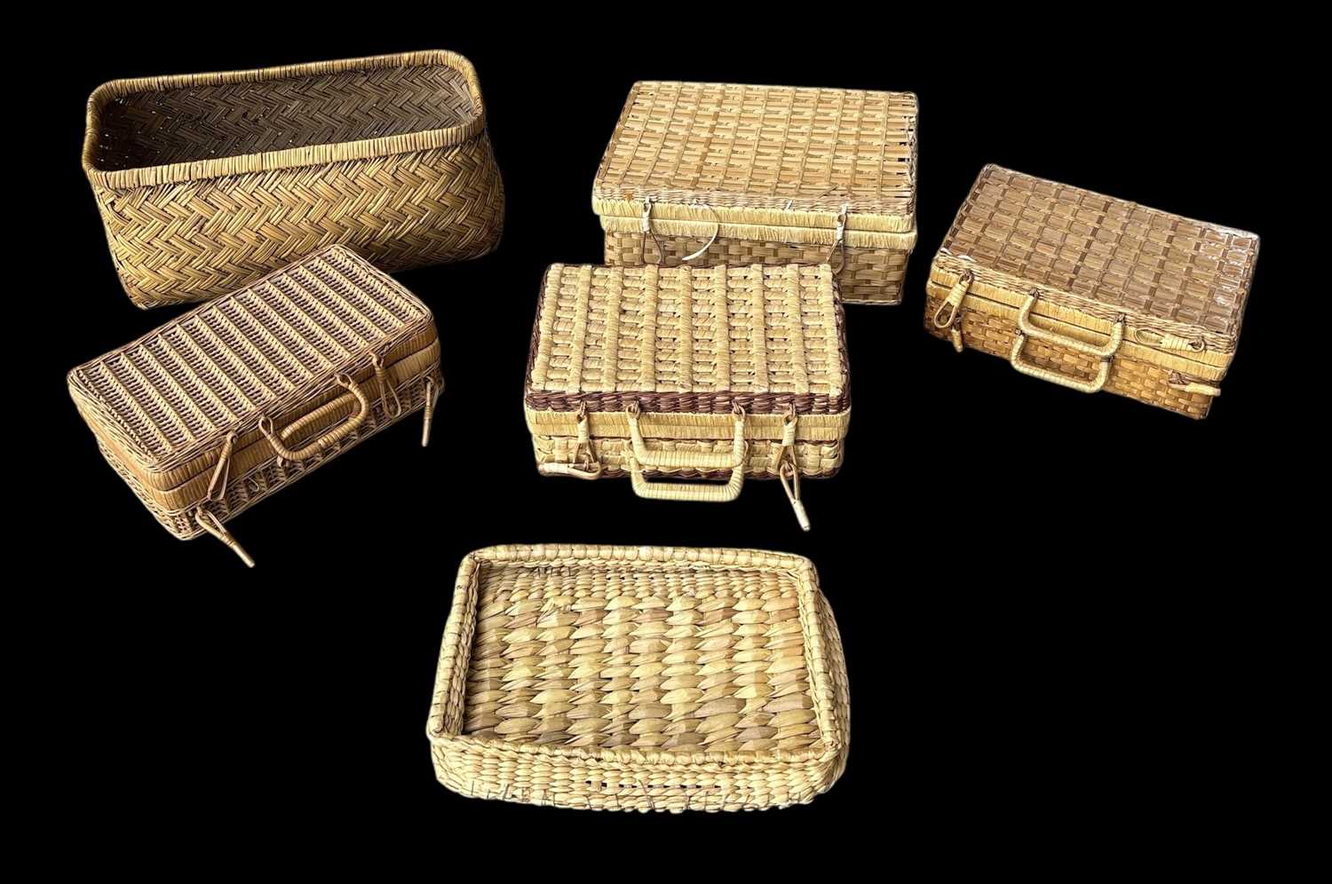 Lot 63 - Woven storage cases and baskets.