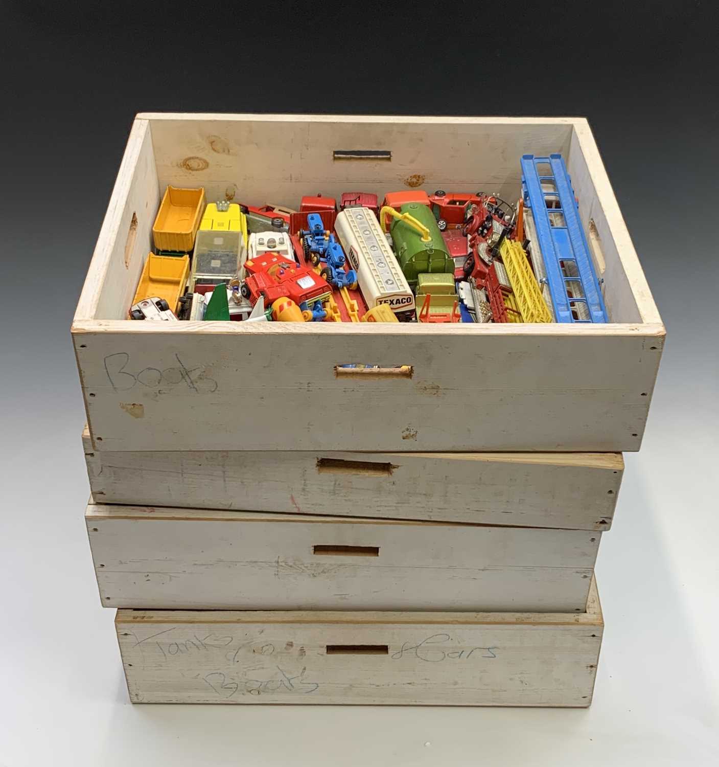 Lot 601 - DIECAST TOYS: Four wooden drawers contaiing