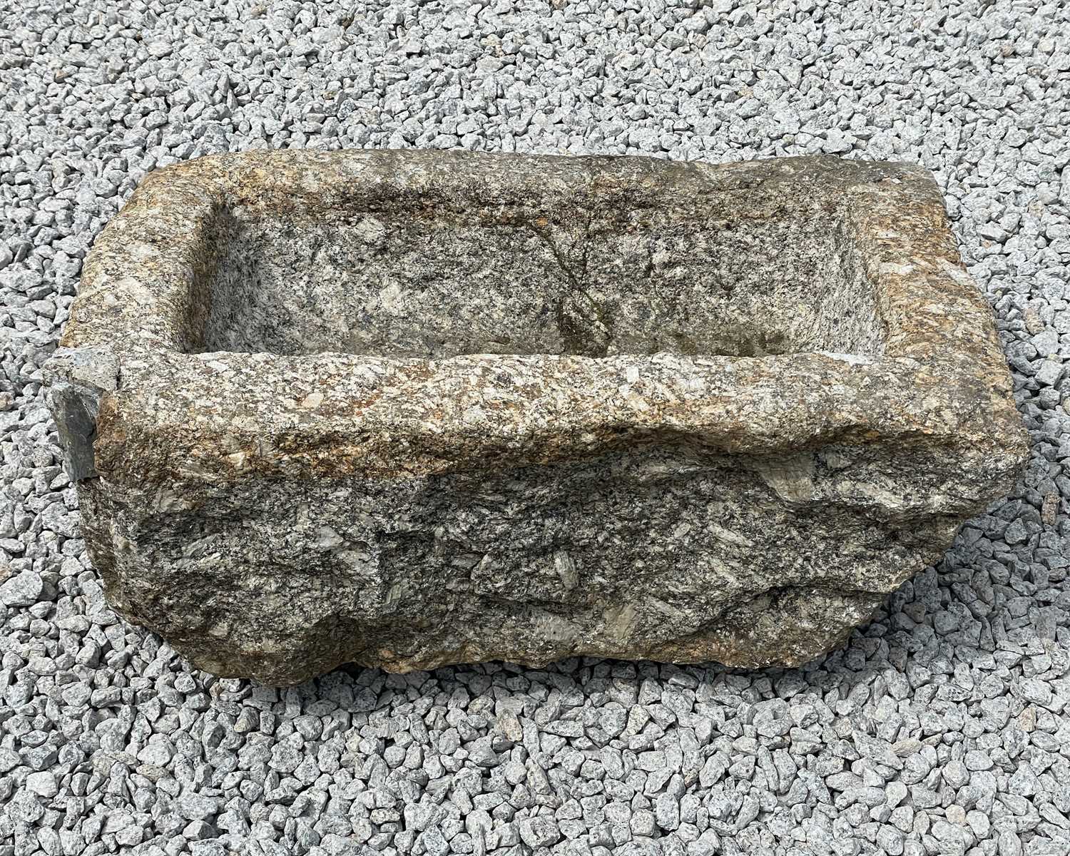 Lot 766 - A weathered granite trough.