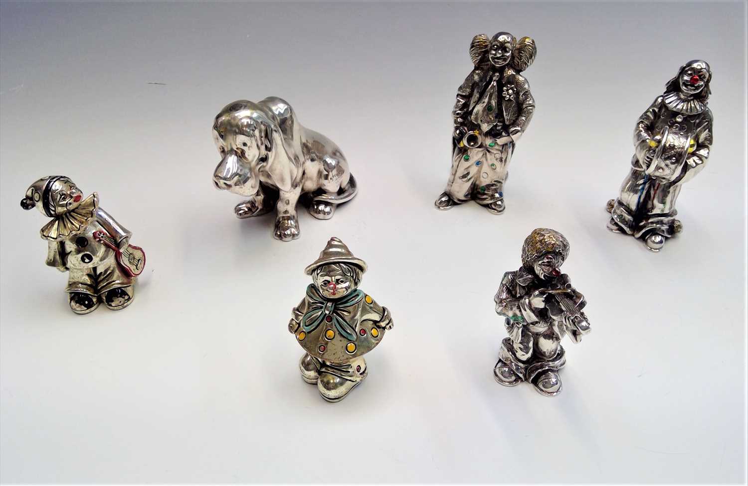 Lot 2002 - Three Magrino enamelled silver clown models