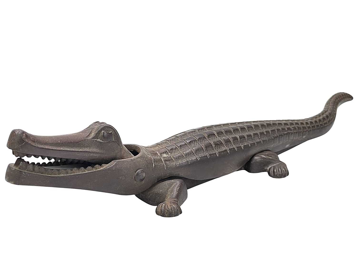 Lot 127 - A Nestor cast iron crocodile nutcracker.