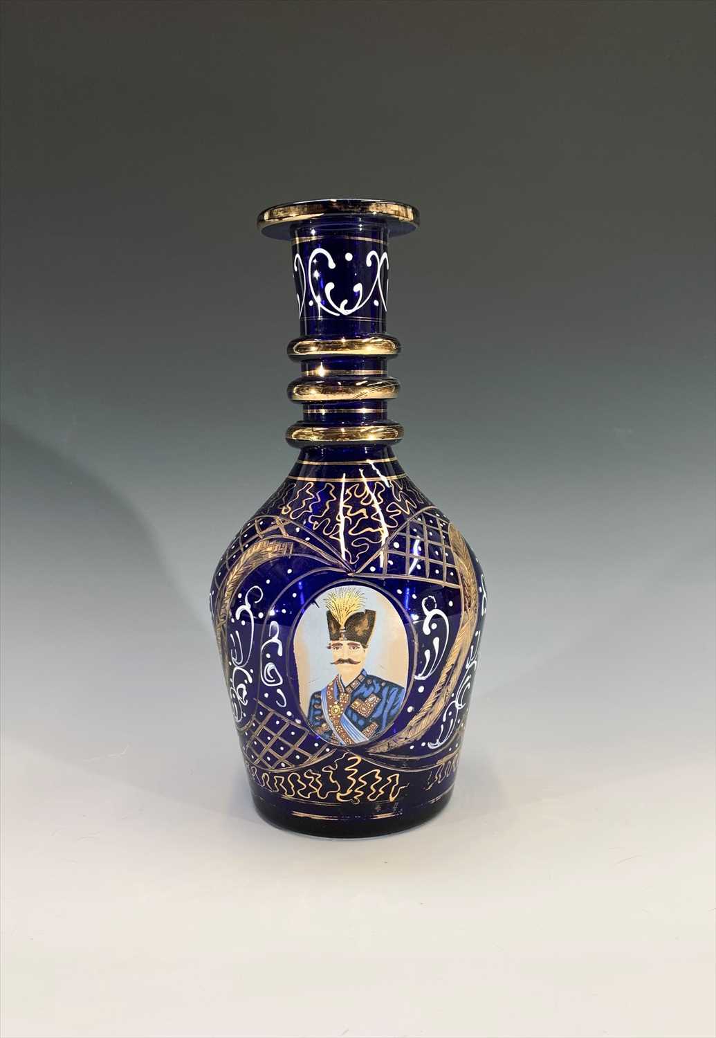 Lot 1054 - A Turkish Market glass decanter, the blue