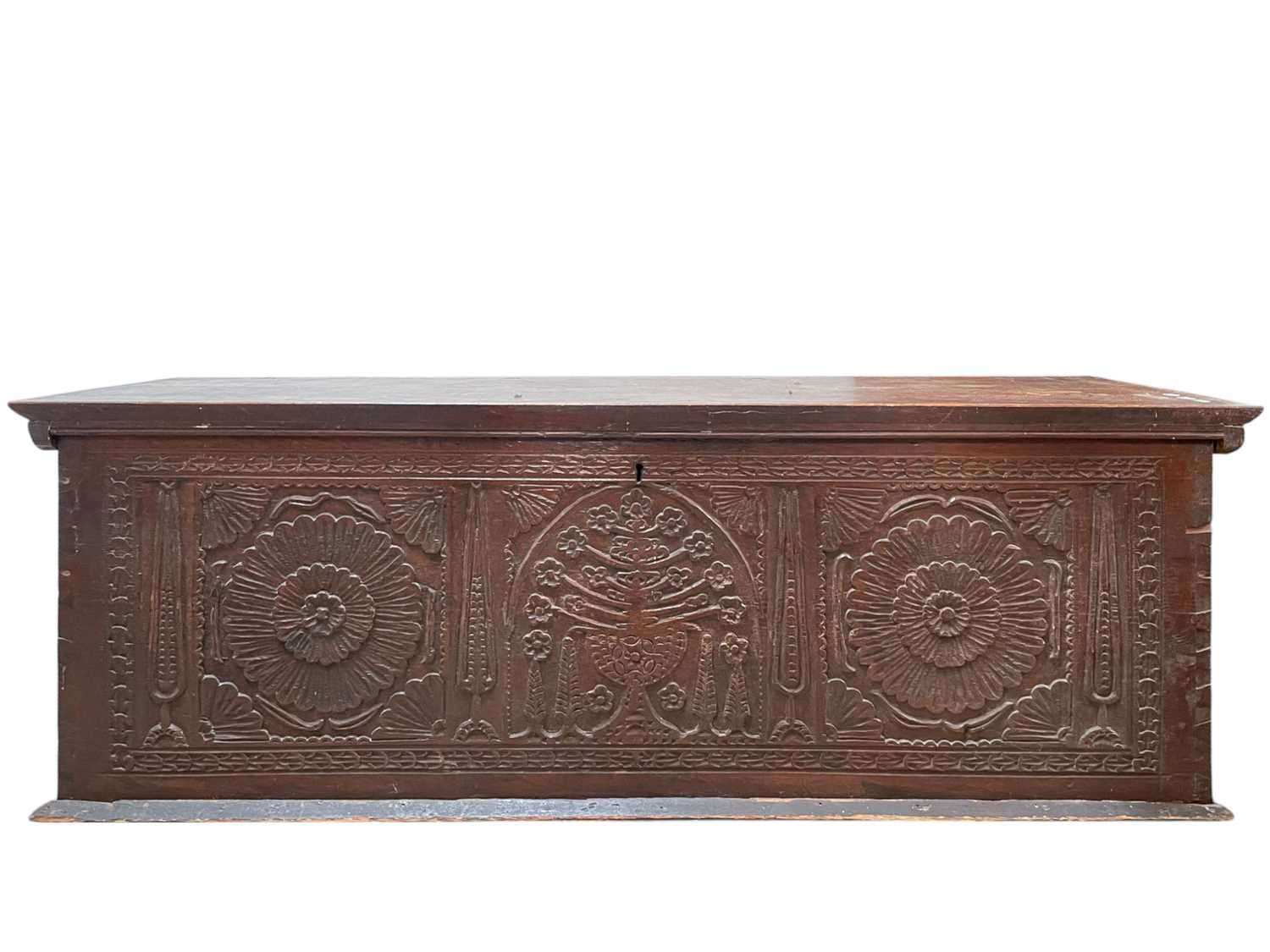 Lot 894 - A Cypriot carved and stained cypress wood