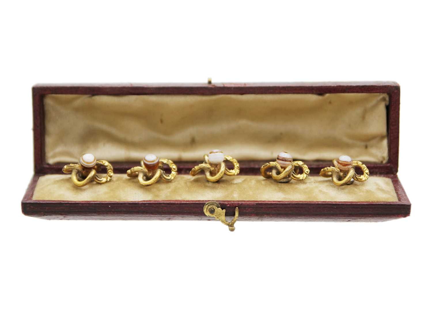 Lot 26 - A set of five pinchbeck, banded agate set