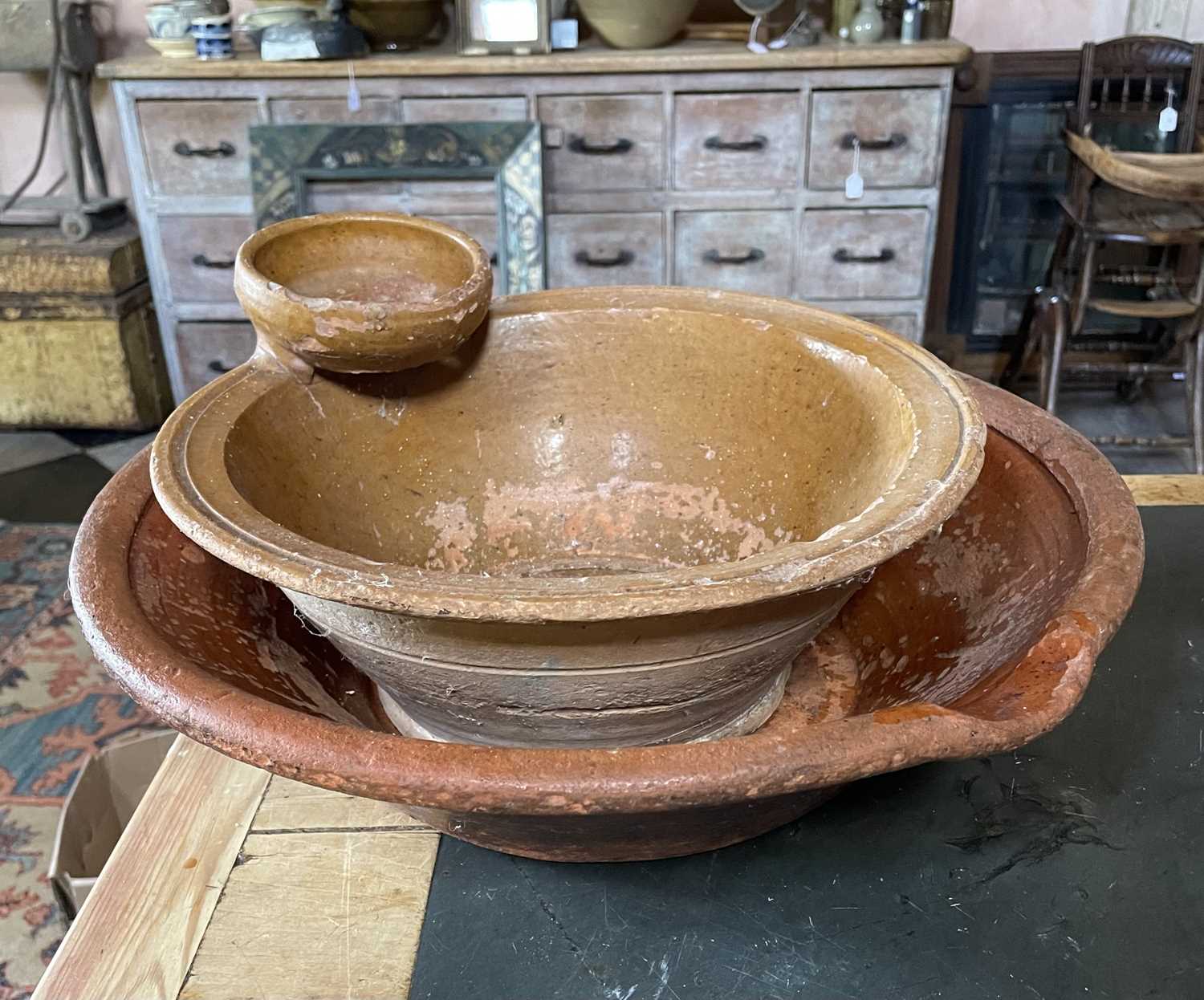 Lot 152 - A small terracotta pancheon with an attached