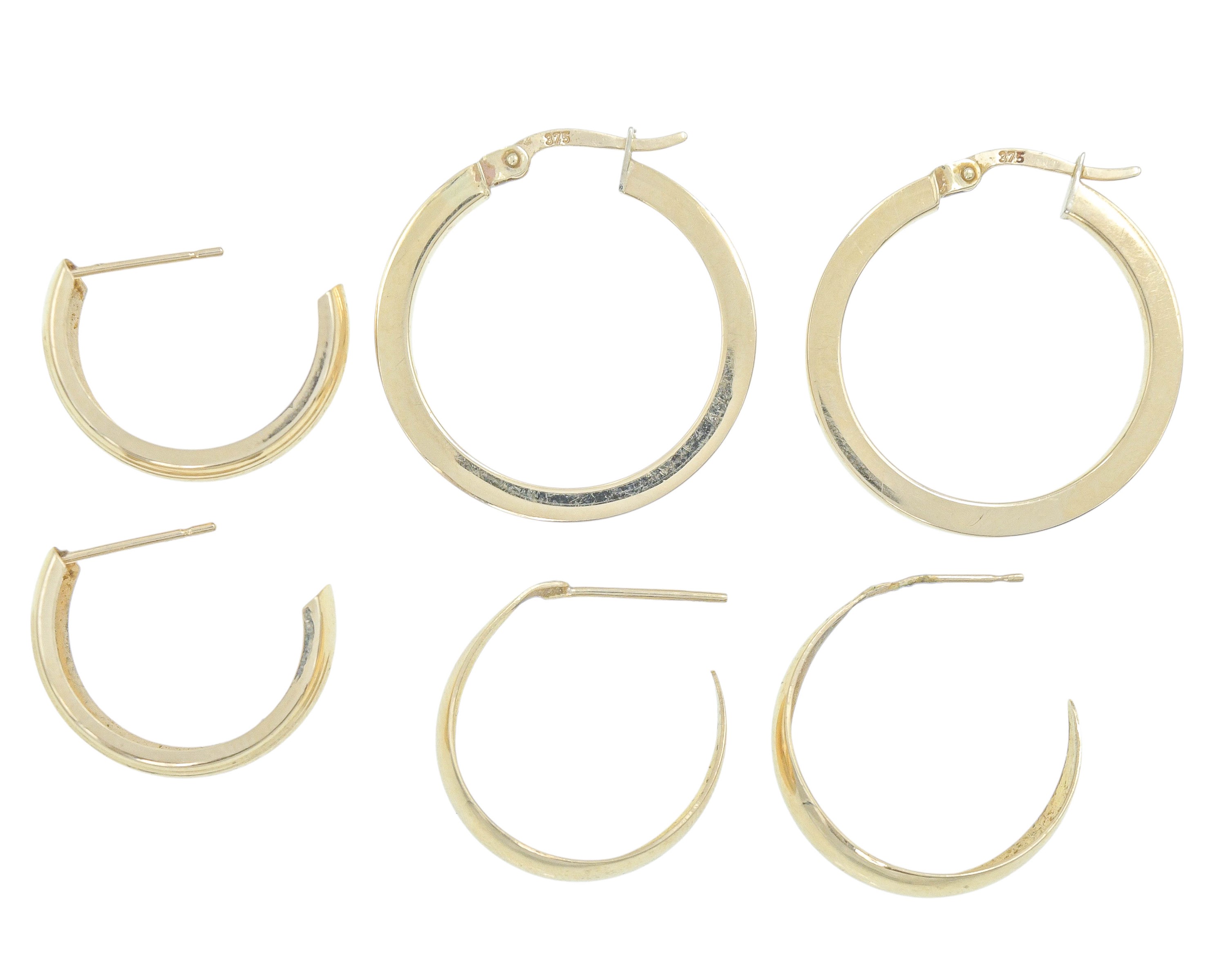 Lot 87 - Three pairs of 9k gold hoop earrings.