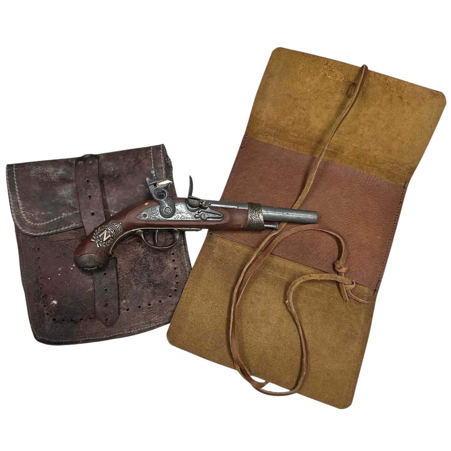 Lot 184 - A reproduction flintlock pistol and two