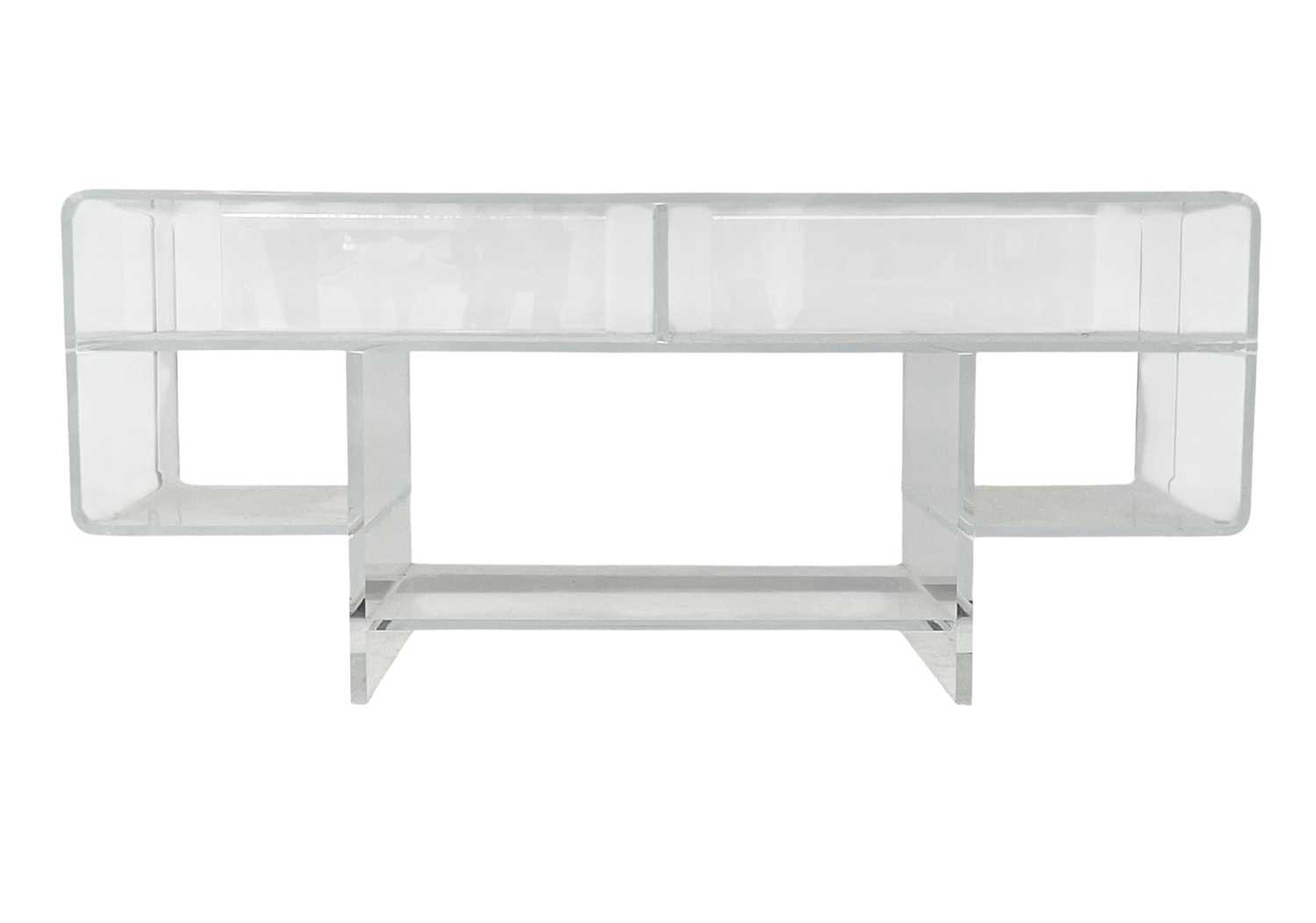 Lot 846 - A lucite entertainment stand.