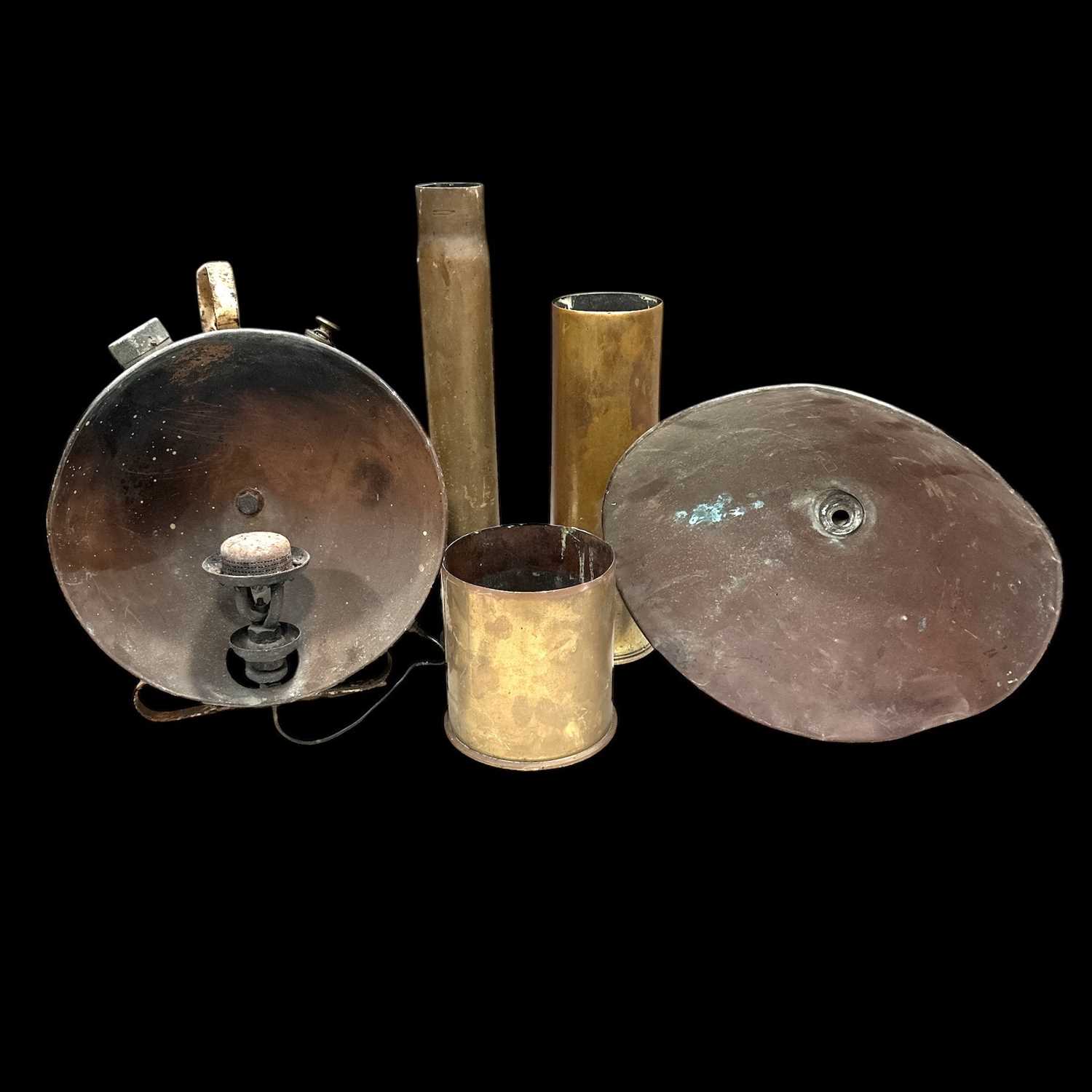 Lot 136 - Two WWI brass shells, one WWII shell, and a