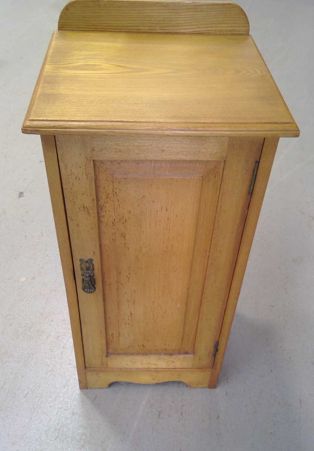 Lot 58 - An Oak Pot Cupboard. The Cupboard is 77cm